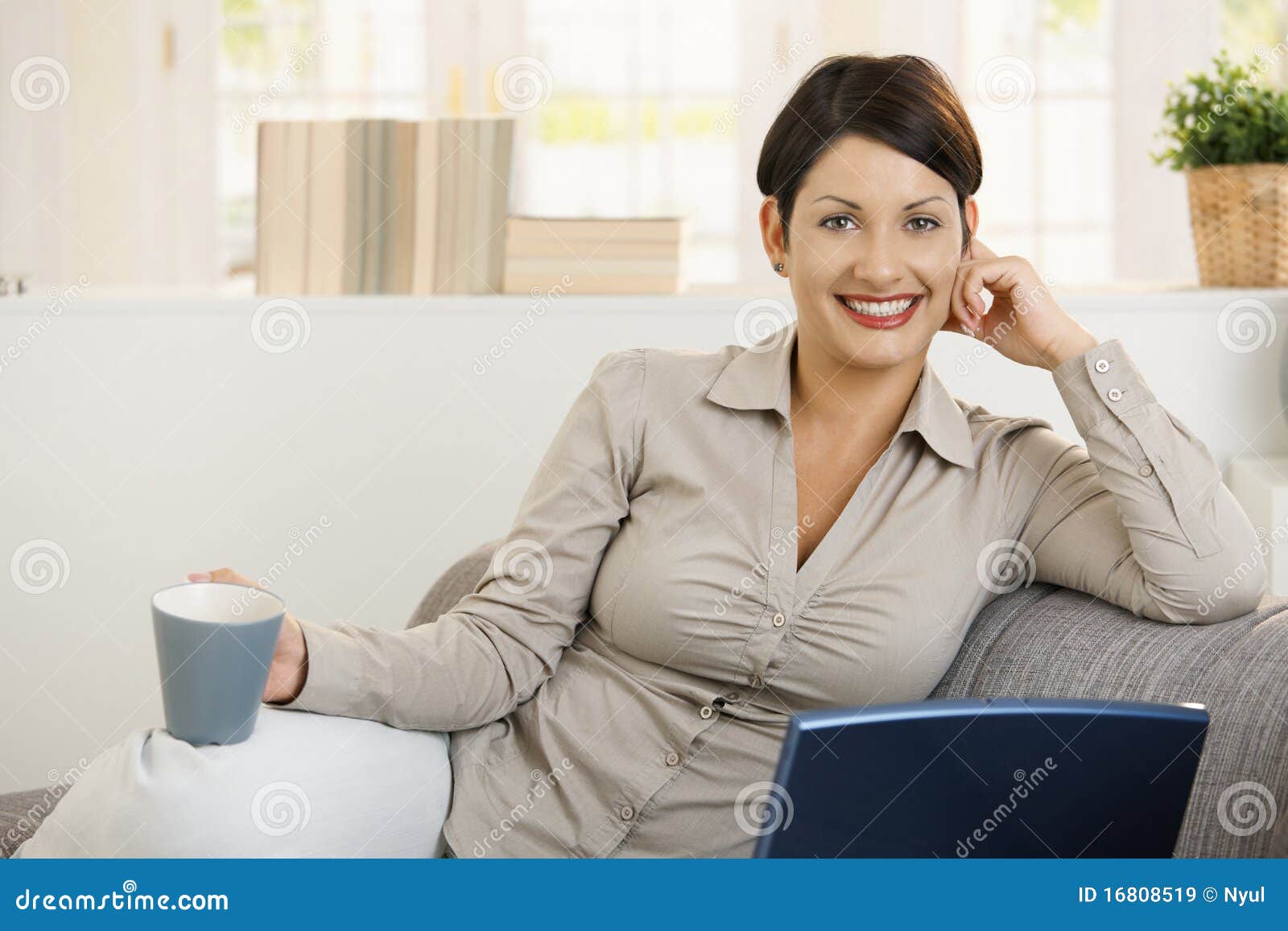 Young woman at home stock image. Image of indoors, cosy - 16808519