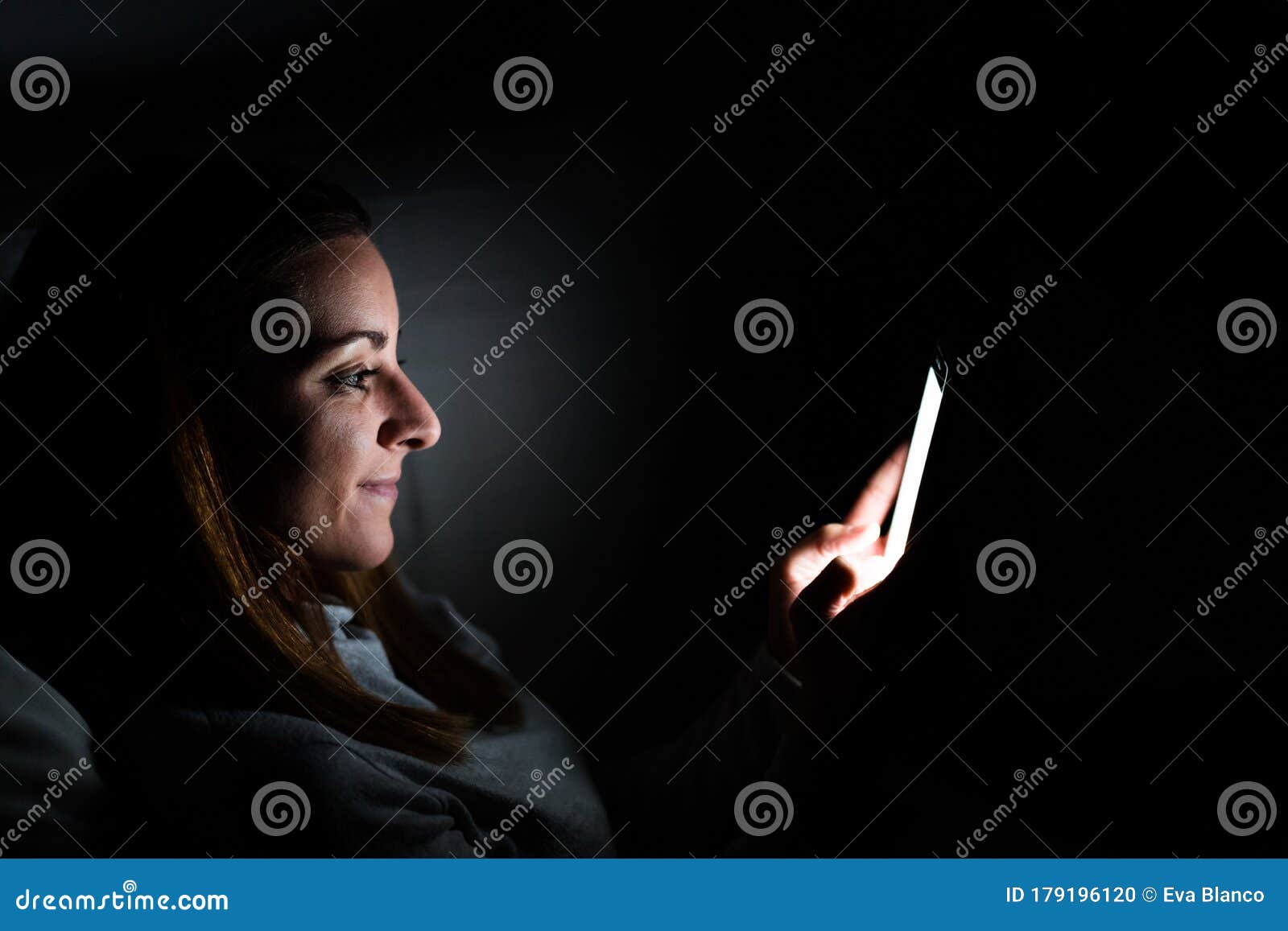 Young Woman at Home Using Mobile Phone. Night Time Stock Photo - Image ...