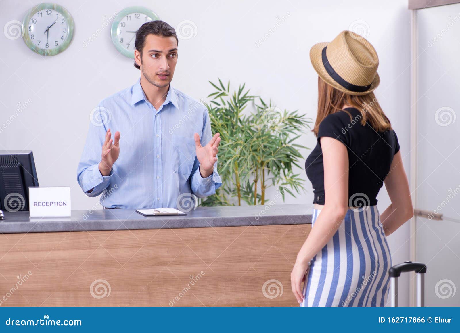 Young Woman at Hotel Reception Stock Photo - Image of departing ...