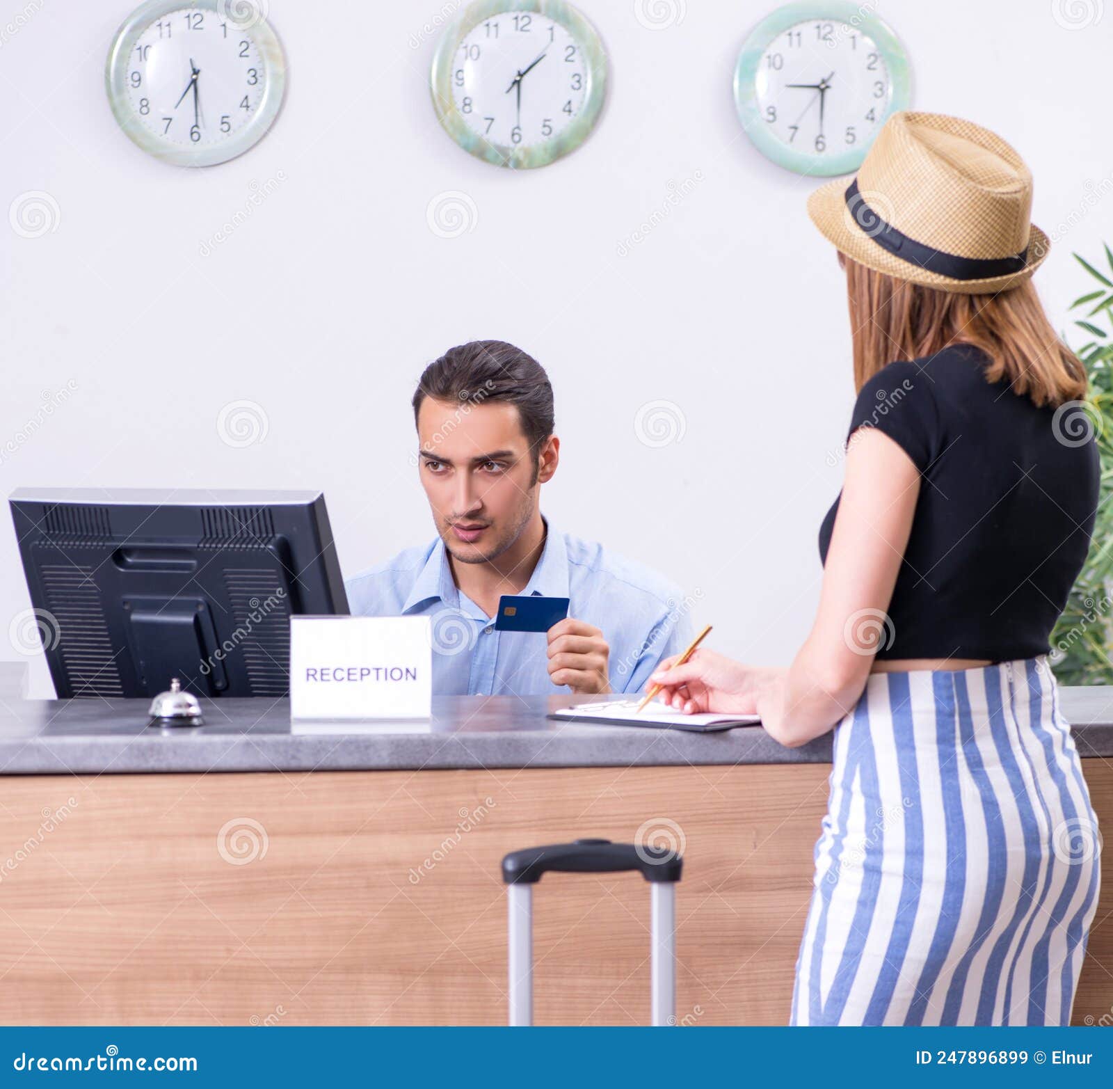 Young Woman at Hotel Reception Stock Image - Image of checkout ...