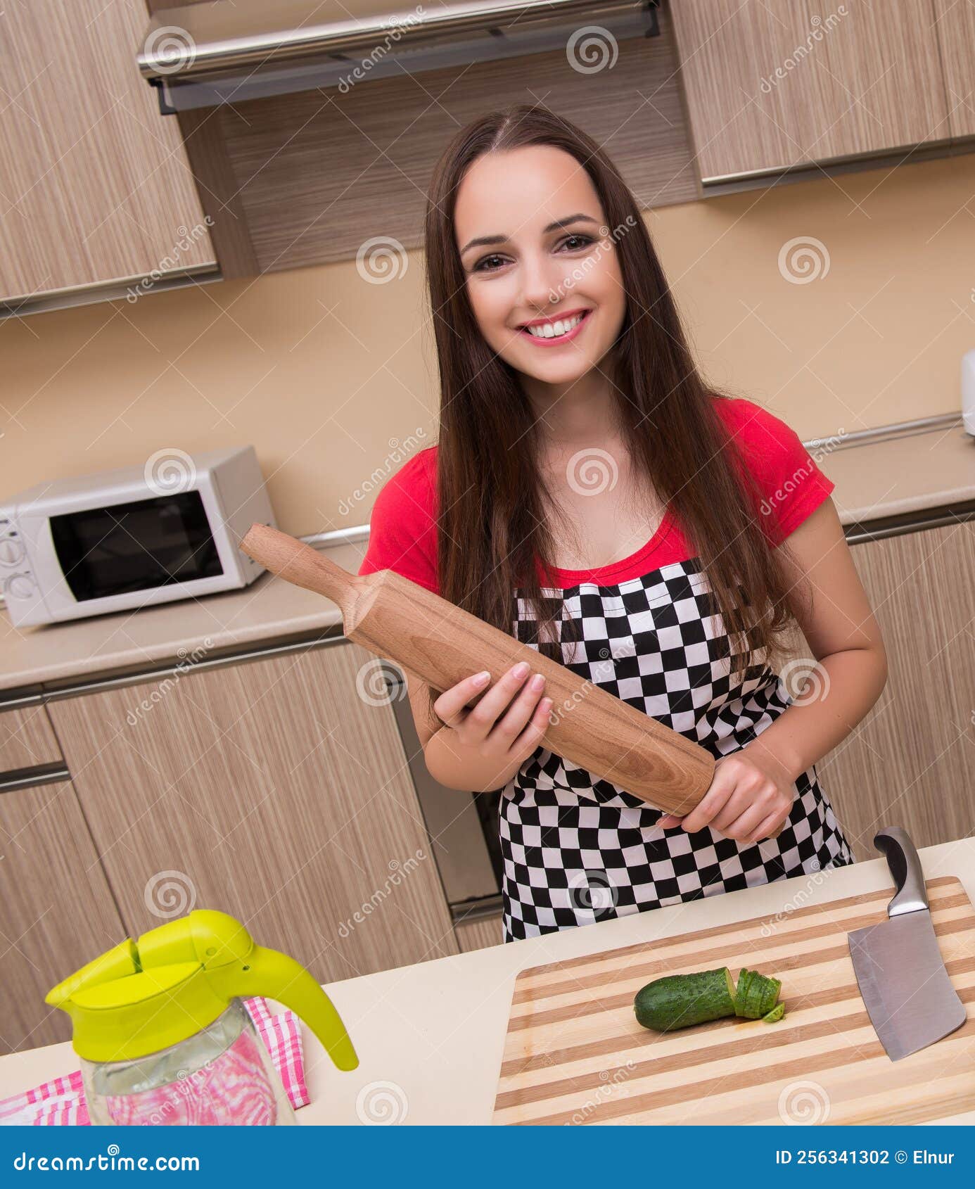 Young Woman Housewife Working in the Kitchen Stock Photo - Image of ...