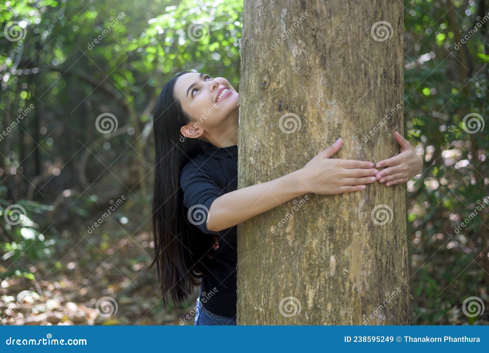 Young Woman Hugging a Big Tree in the Woods, Environment and ...
