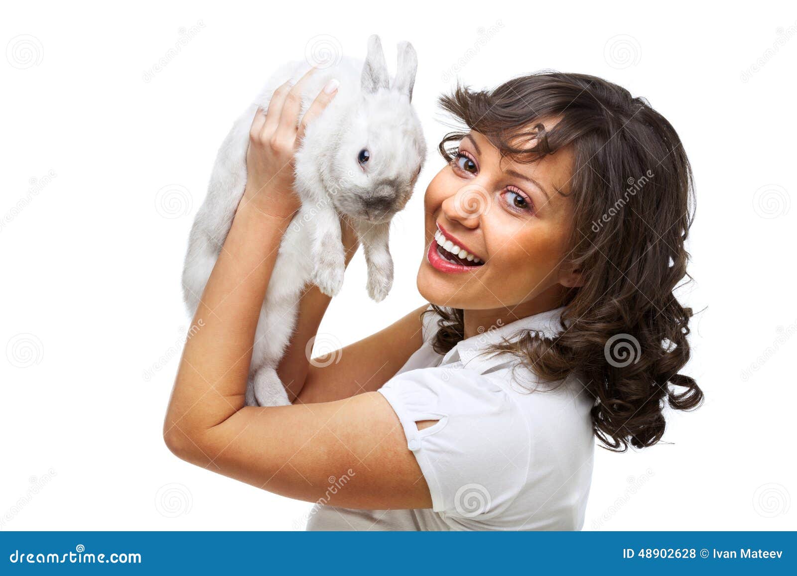 Young woman hugging rabbit stock photo. Image of toothy - 48902628