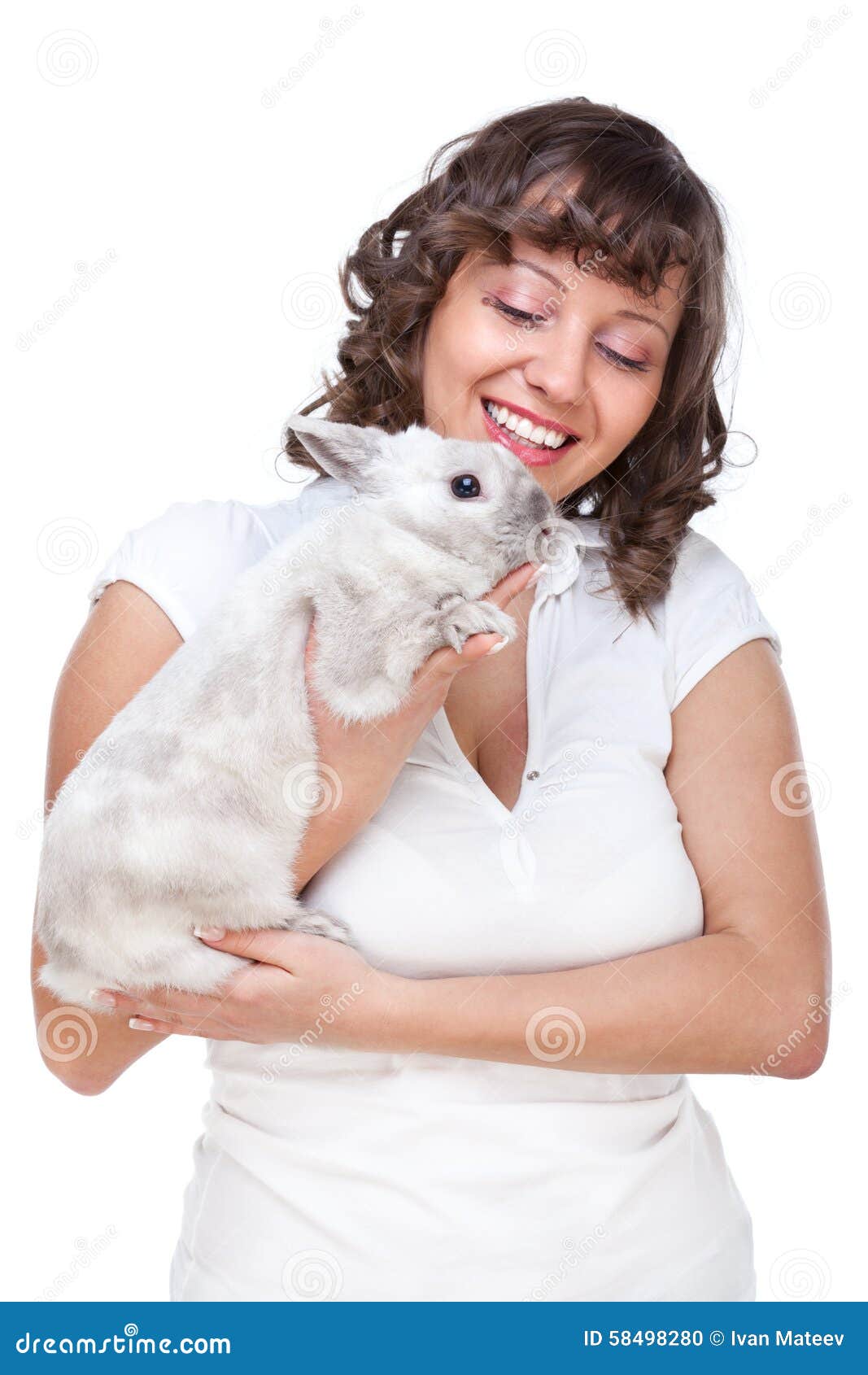 Young woman hugging rabbit stock photo. Image of 1000012576 - 58498280
