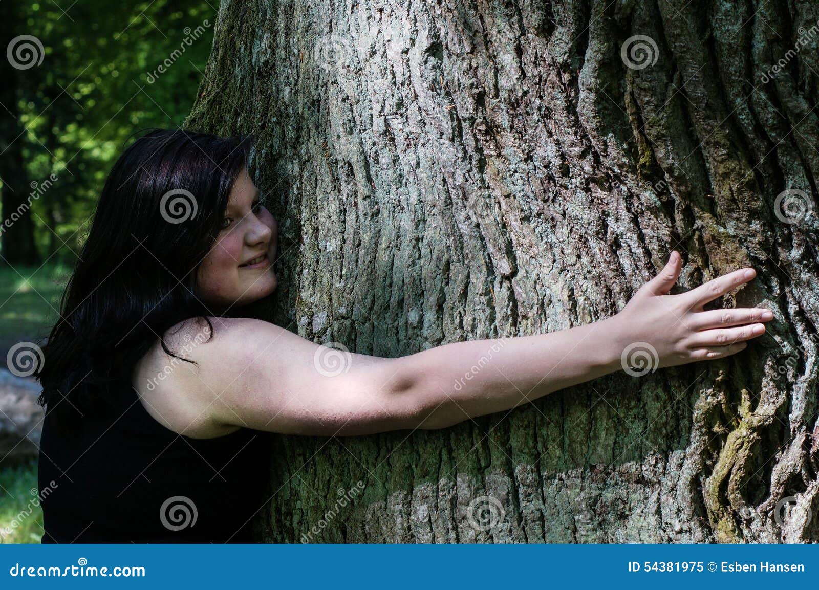 Young Woman hugging a Tree stock image. Image of copy - 54381975