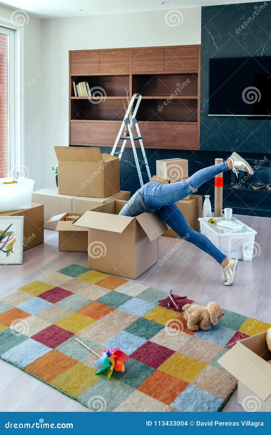 Woman Inside a Box Preparing the Move Stock Photo - Image of preparing ...