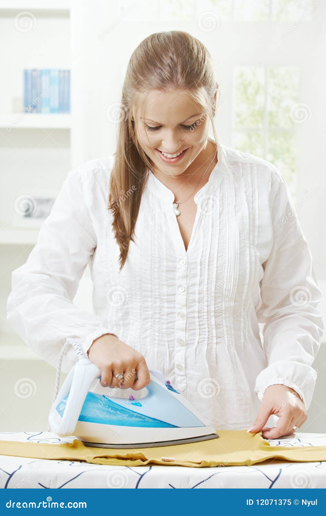 Young woman ironing stock image. Image of face, color - 12071375