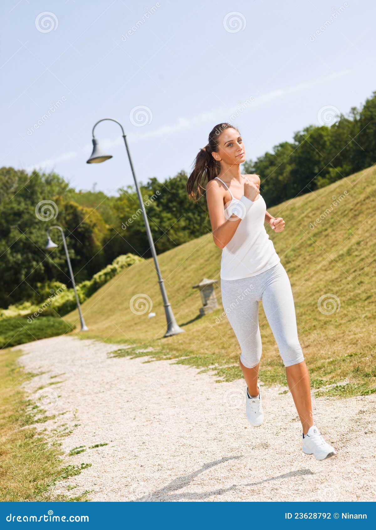 Young woman jogging stock photo. Image of girl, tree - 23628792