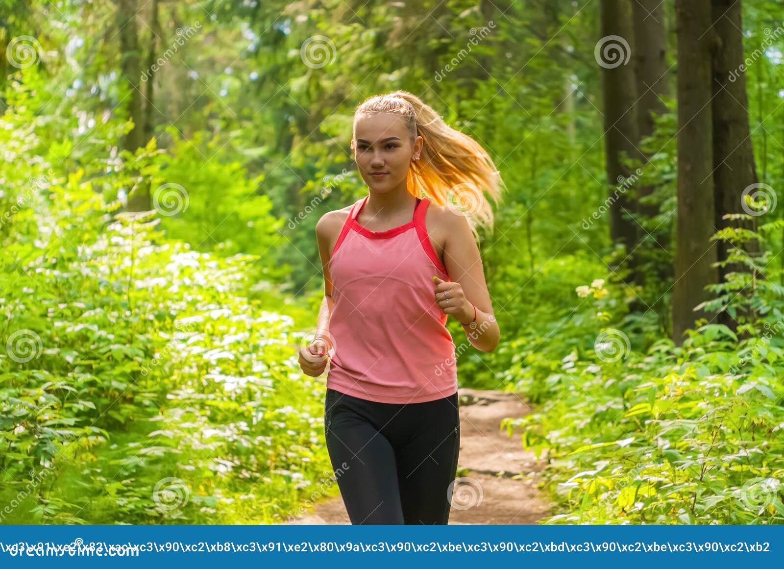 Young Woman Jogging in the Forest Stock Image - Image of jogger, build ...