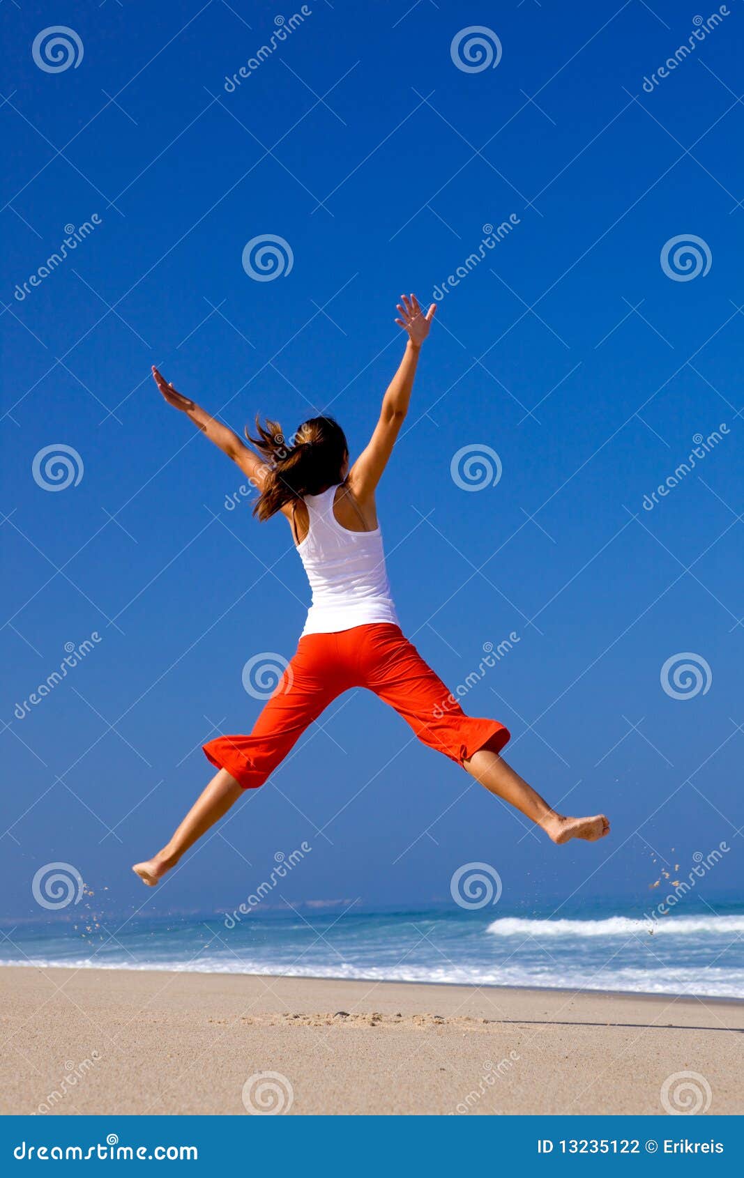 Young woman jumping stock photo. Image of athletic, energy - 13235122