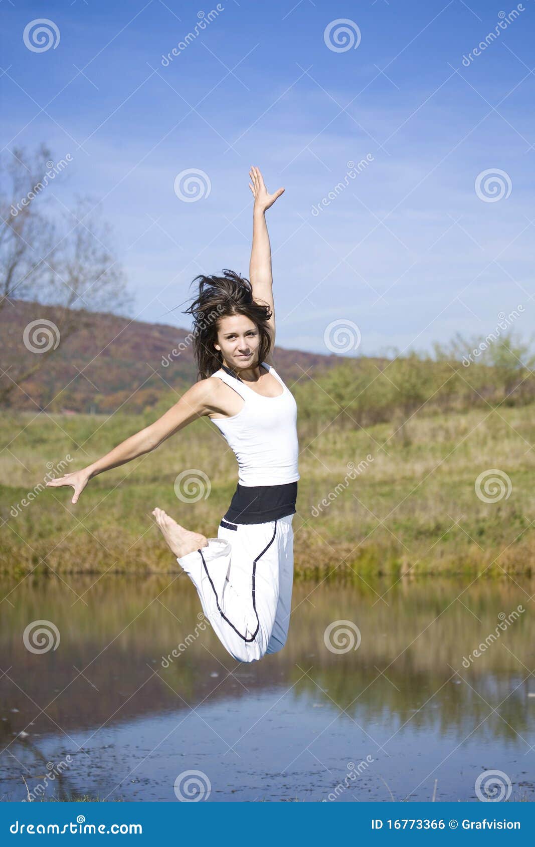 Young woman jumping stock photo. Image of human, life - 16773366