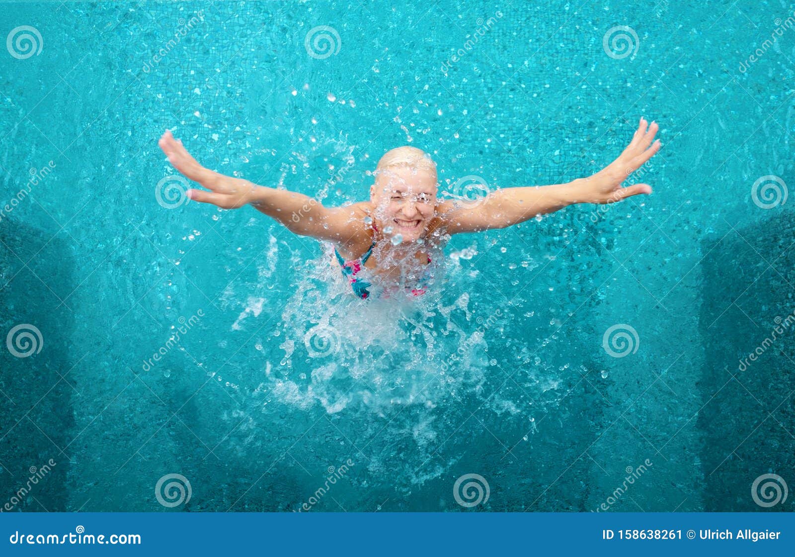 Young Woman Jumping Out of the Pool Stock Image - Image of enjoyment ...