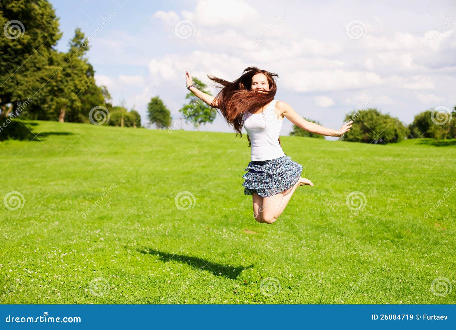 Young Woman Jumping Outdoor Stock Image - Image of active, energy: 26084719