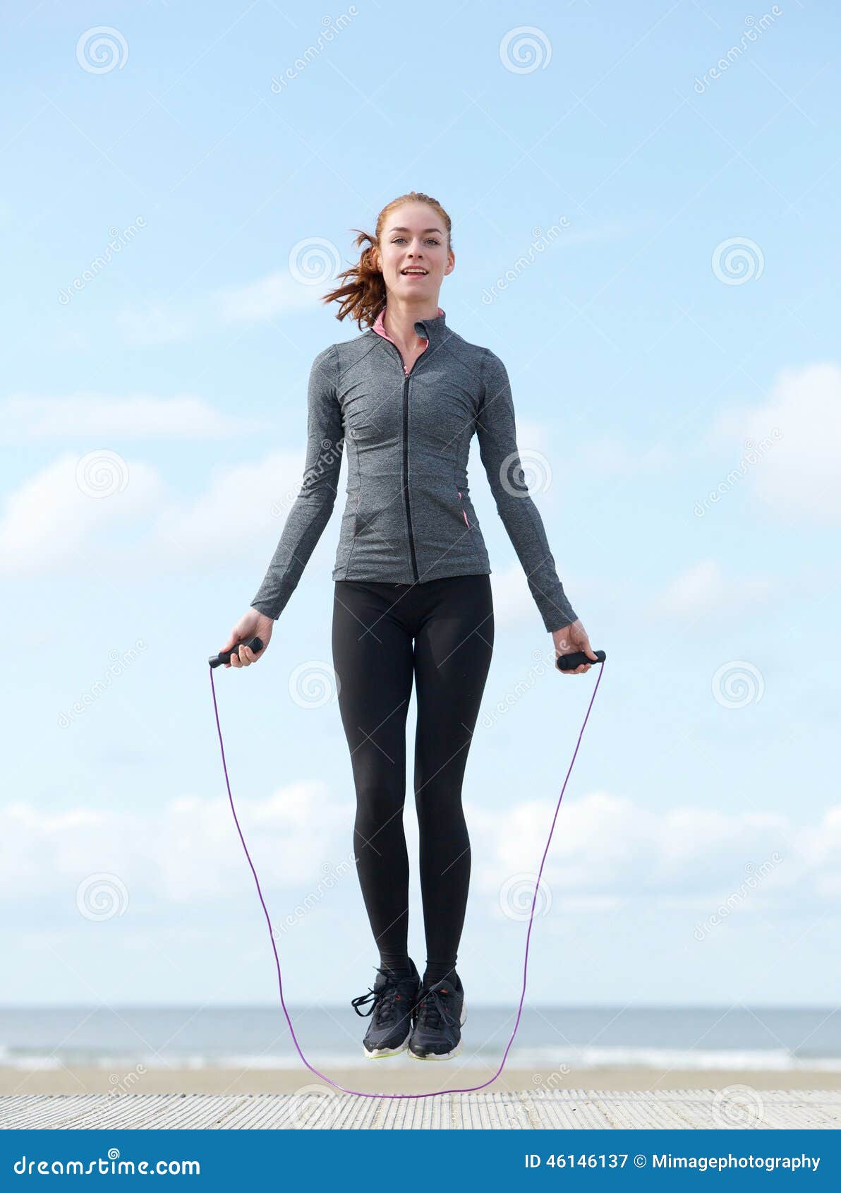 Young Woman Jumping with Skipping Rope Outdoors Stock Image - Image of ...
