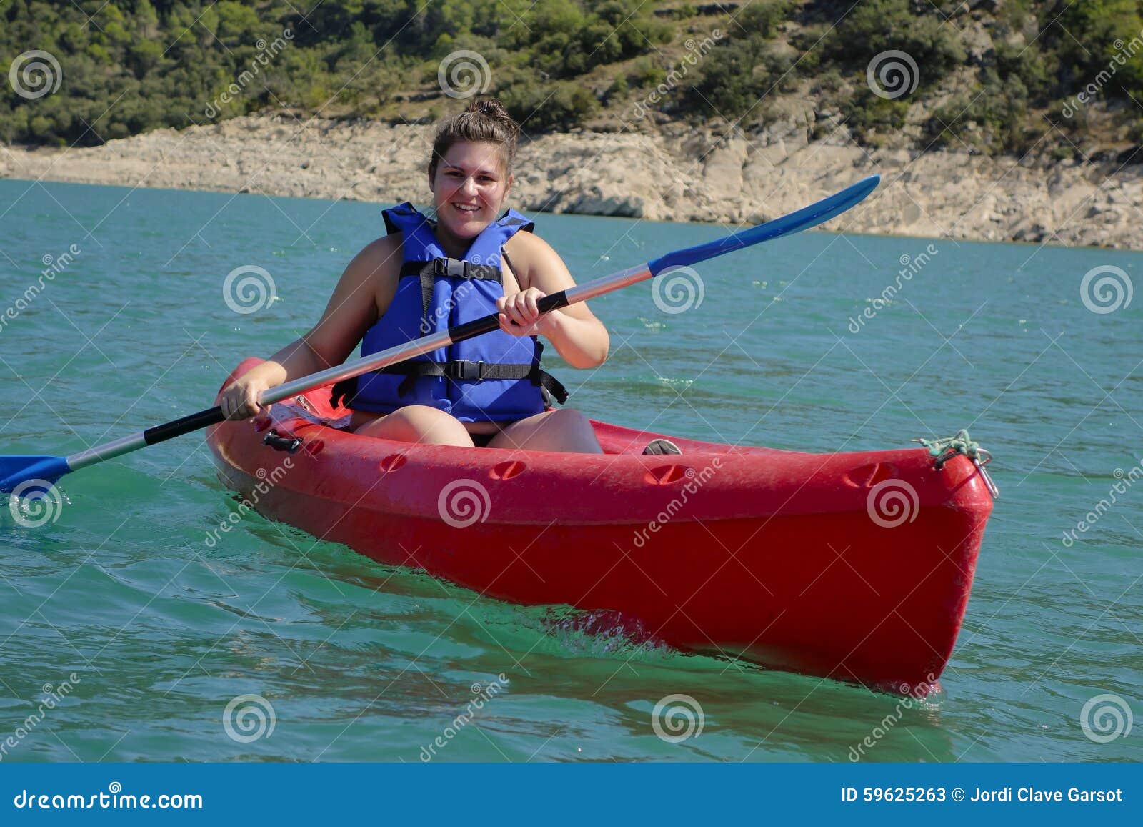 Young woman with a kayak stock image. Image of nature - 59625263
