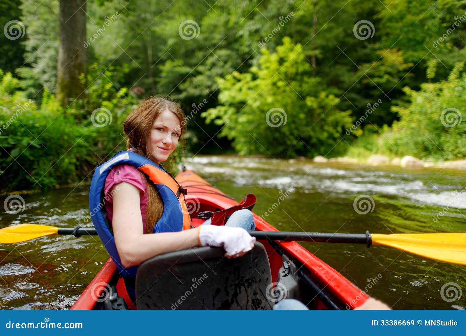 Young woman on a kayak stock image. Image of active, paddle - 33386669