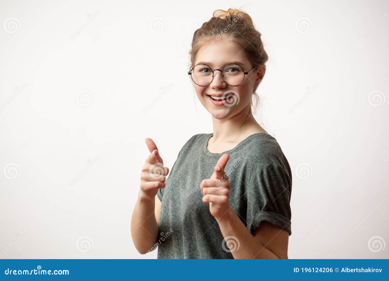 Young Woman Keeping Finger Pointed at Camera, Making Gesture with Index ...