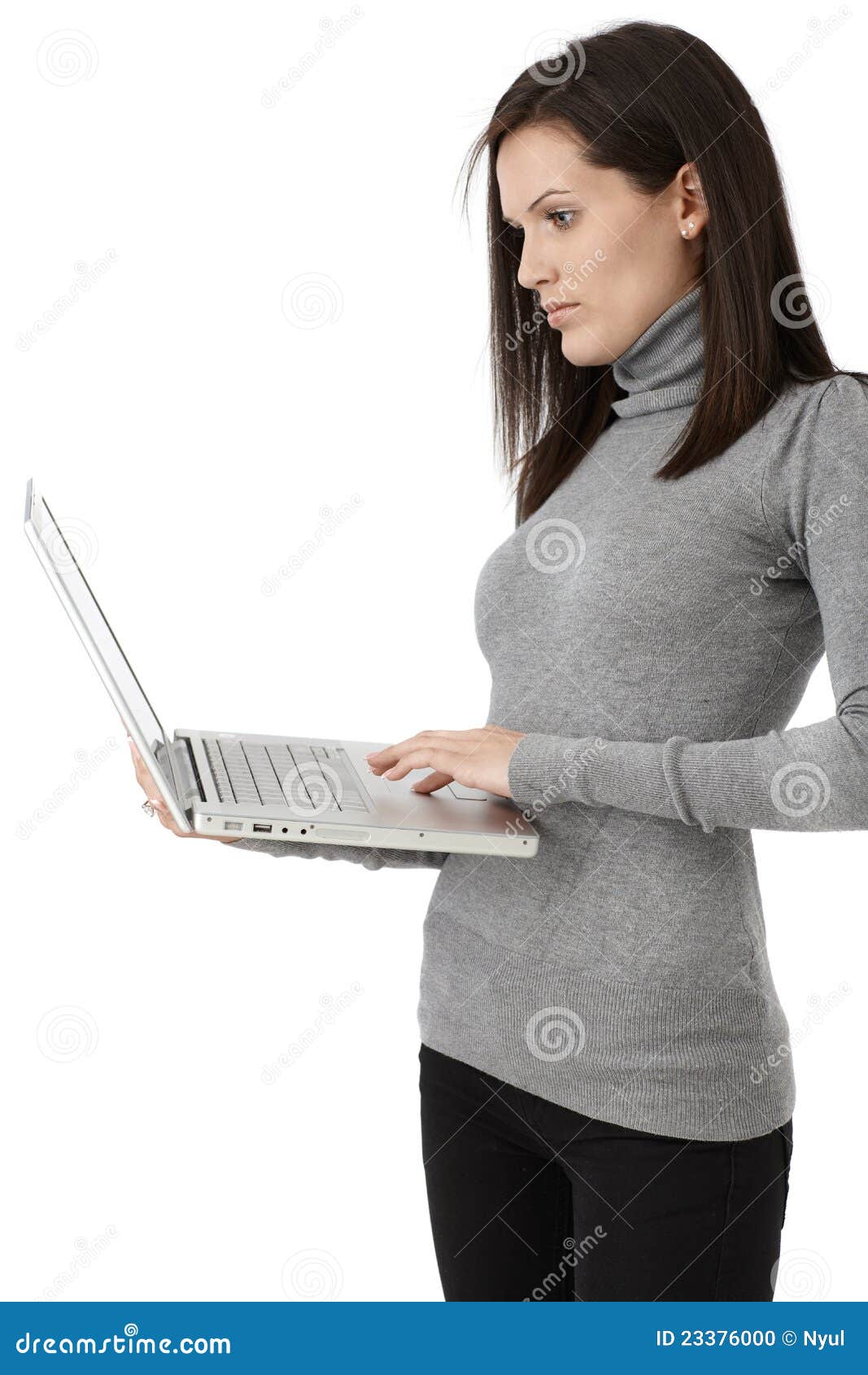 Young woman with laptop stock photo. Image of focusing - 23376000