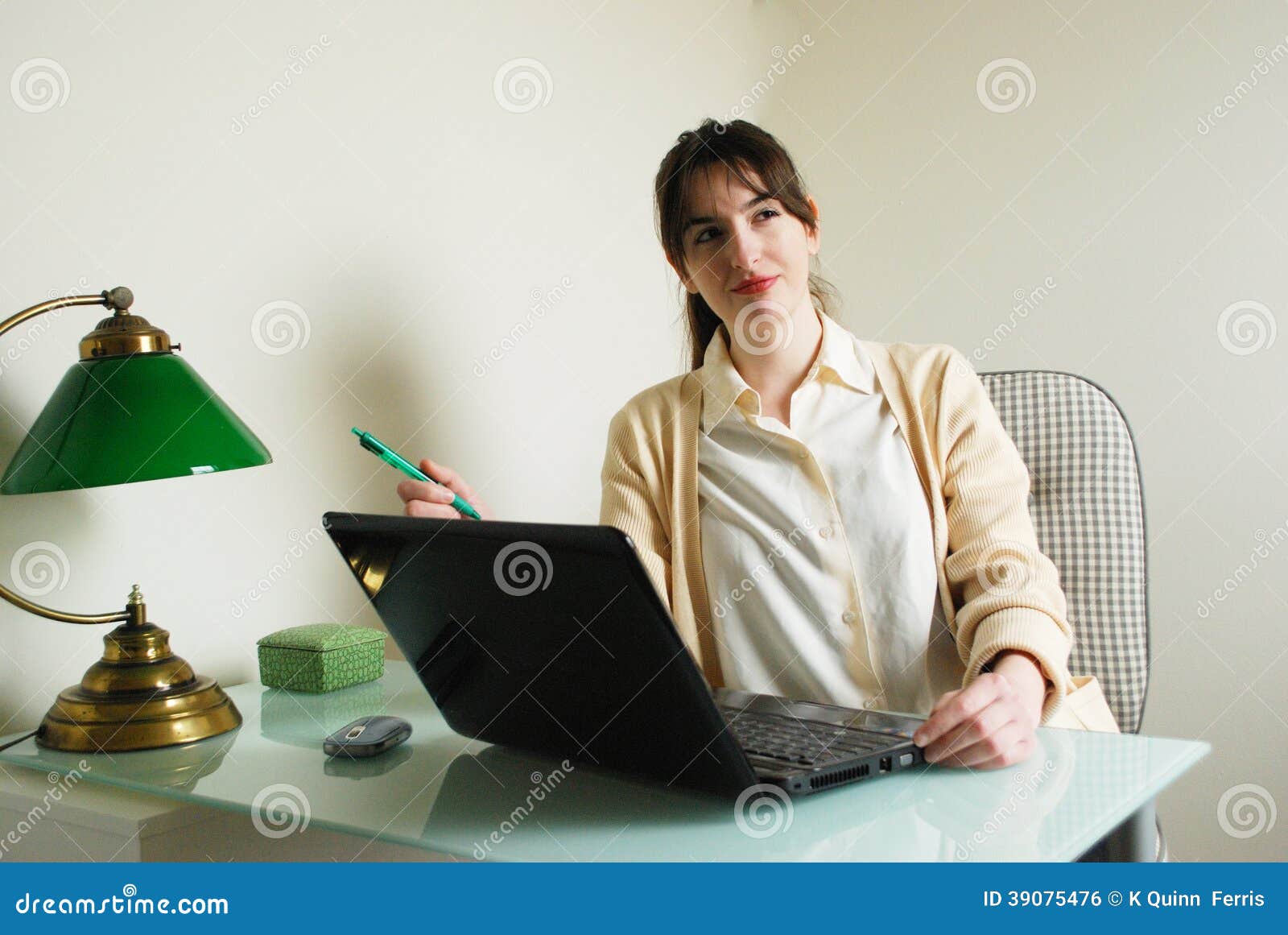 Young Woman with Laptop Computer Contemplating Stock Photo - Image of ...