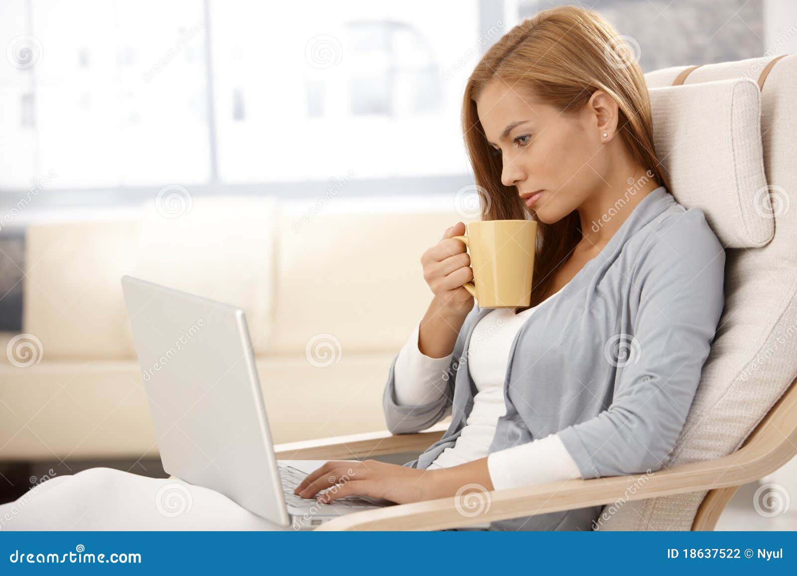 Young Woman with Laptop Drinking Tea Stock Photo - Image of home ...