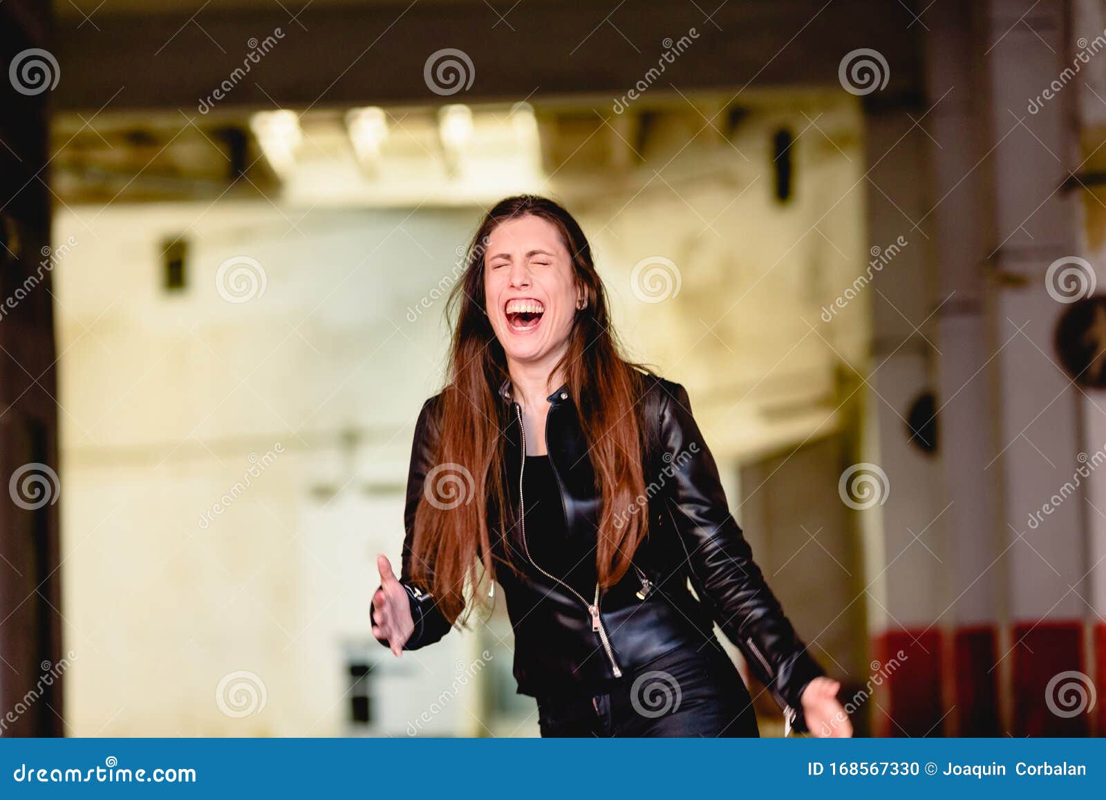 Young Woman Laughing Loudly Stock Photo - Image of person, happiness ...