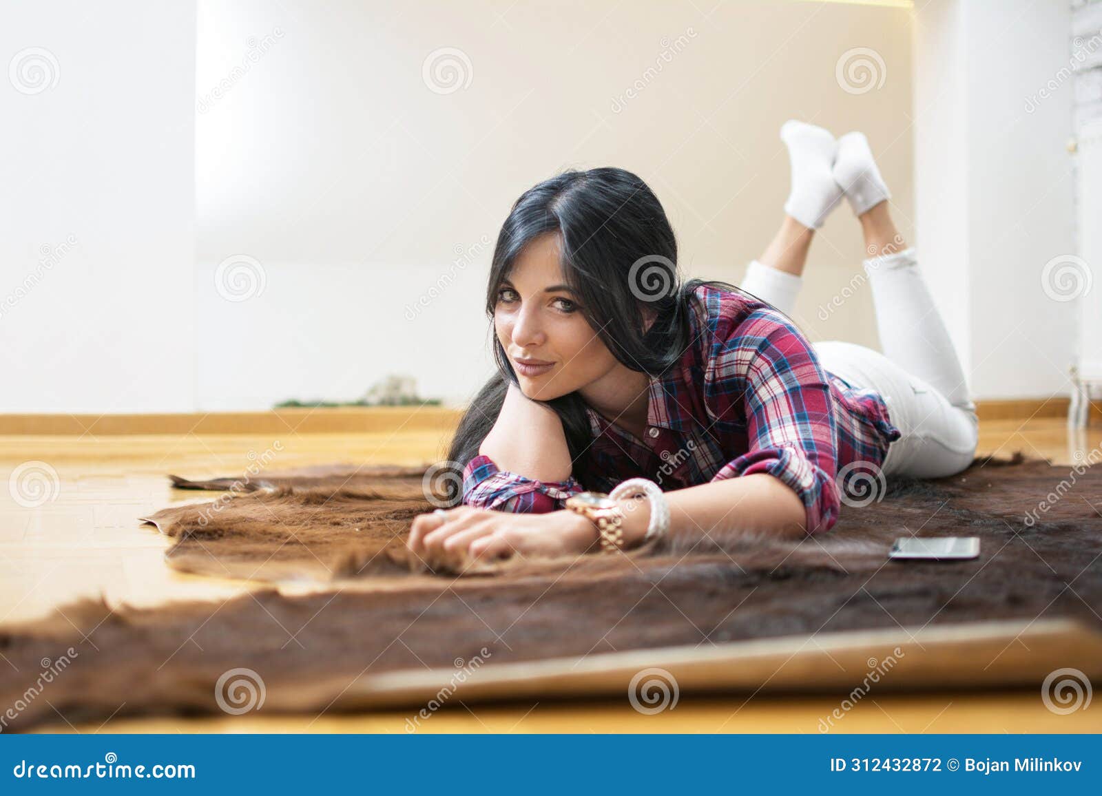 Young Woman Laying Down on the Floor at Home. Stock Photo - Image of ...