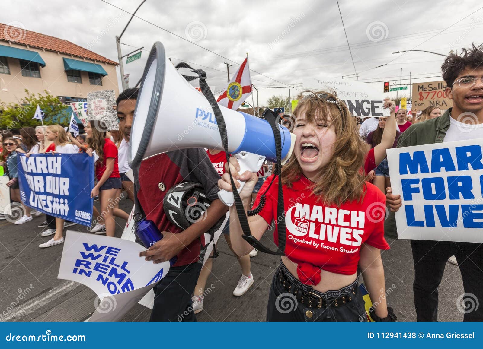Young Woman Leading Crowd with Megaphone at Gun Violence Protest ... Young Woman Leading Crowd with Megaphone at Gun Violence Protest ...