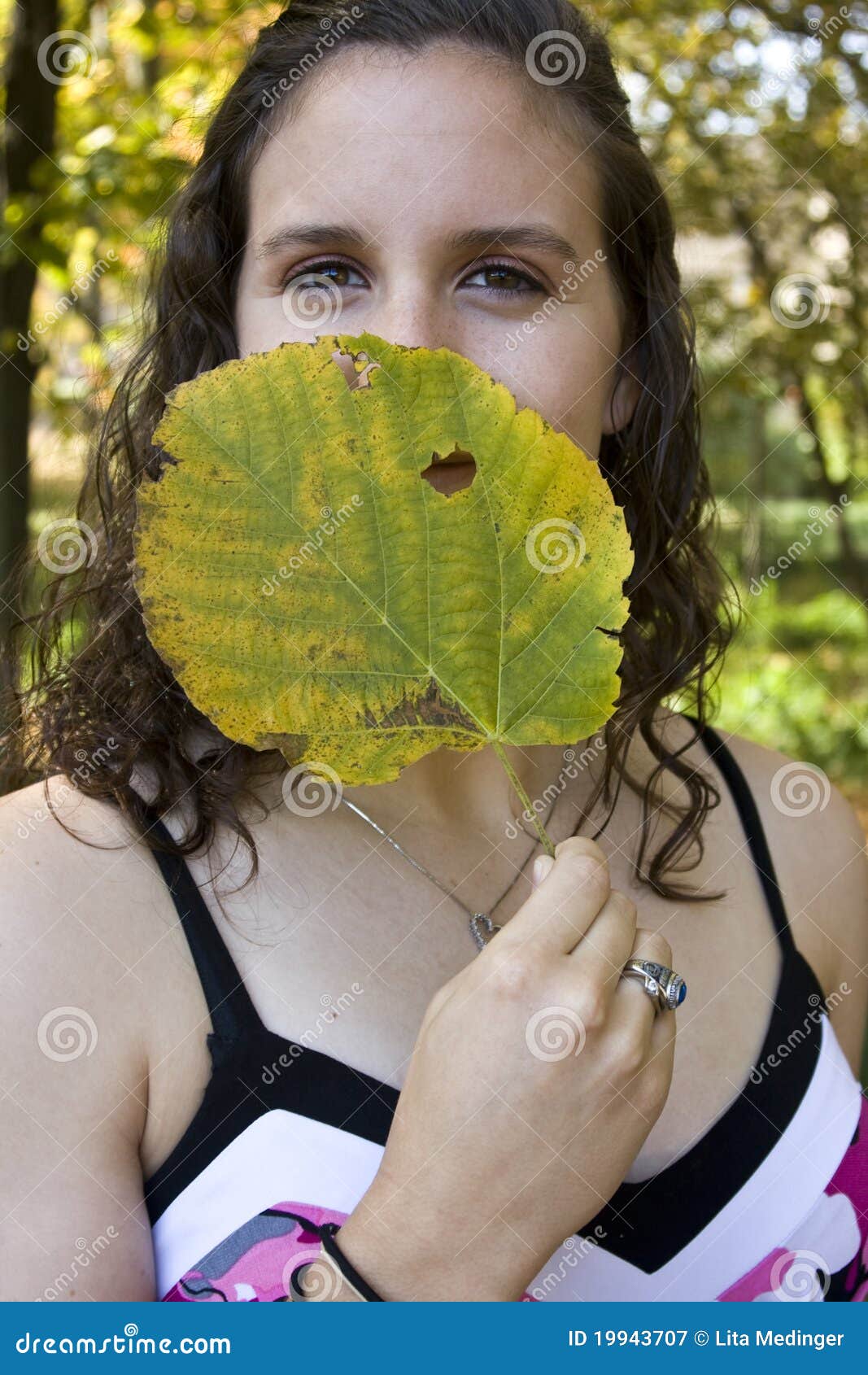 Young Woman with Leaf stock image. Image of leaf, hair - 19943707