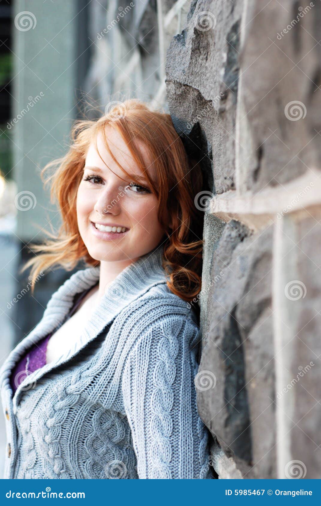 Young Woman Leaning on Wall - Vertical Stock Image - Image of rock ...