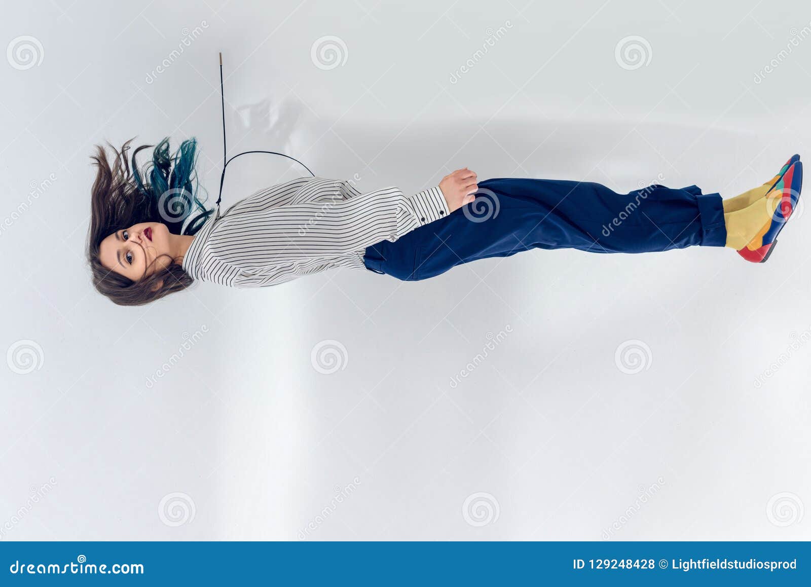 Young Woman Levitating on White Stock Photo - Image of brunette, woman ...