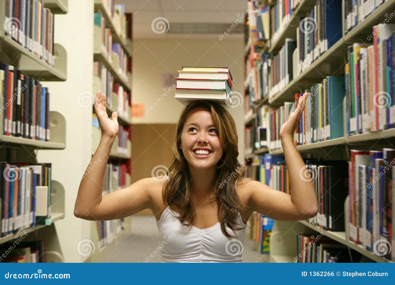 Young Woman in Library stock photo. Image of examination - 1362266