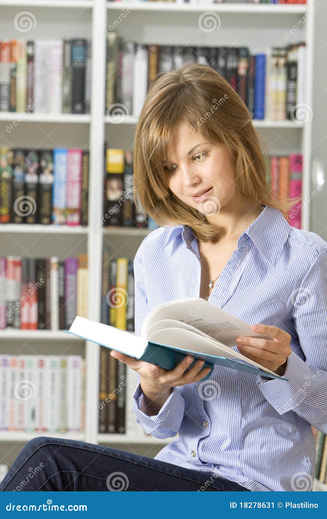 Young woman in the library stock image. Image of bookshelf - 18278631