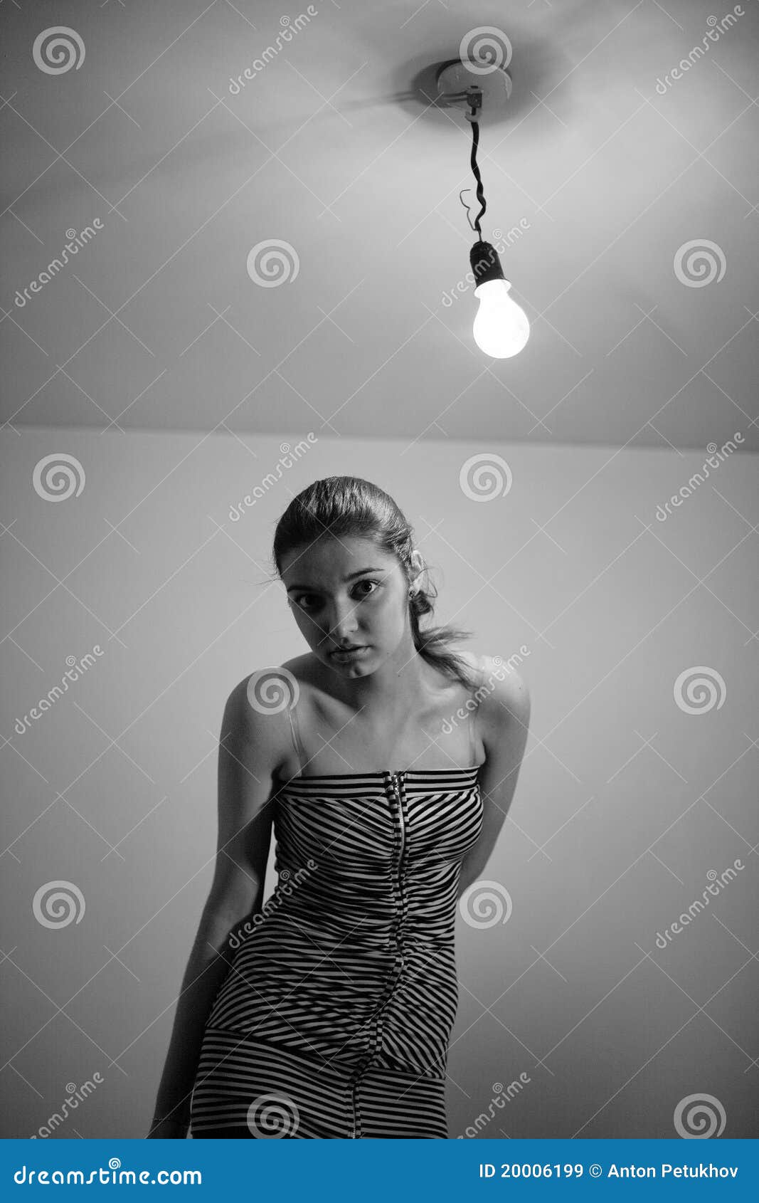Young woman and light bulb stock image. Image of ganging - 20006199