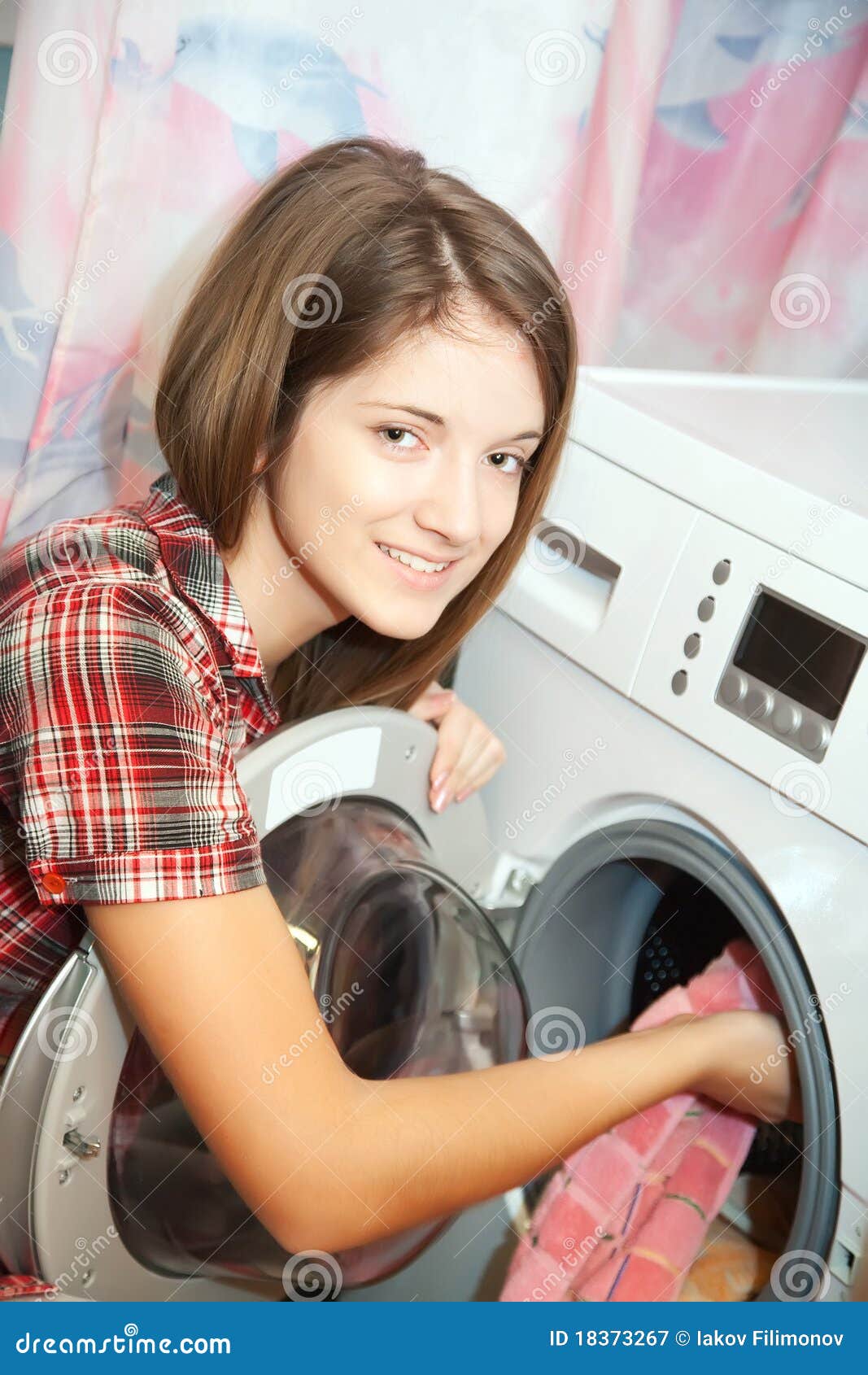 Young Woman Loading the Washing Machine Stock Image - Image of holding ...