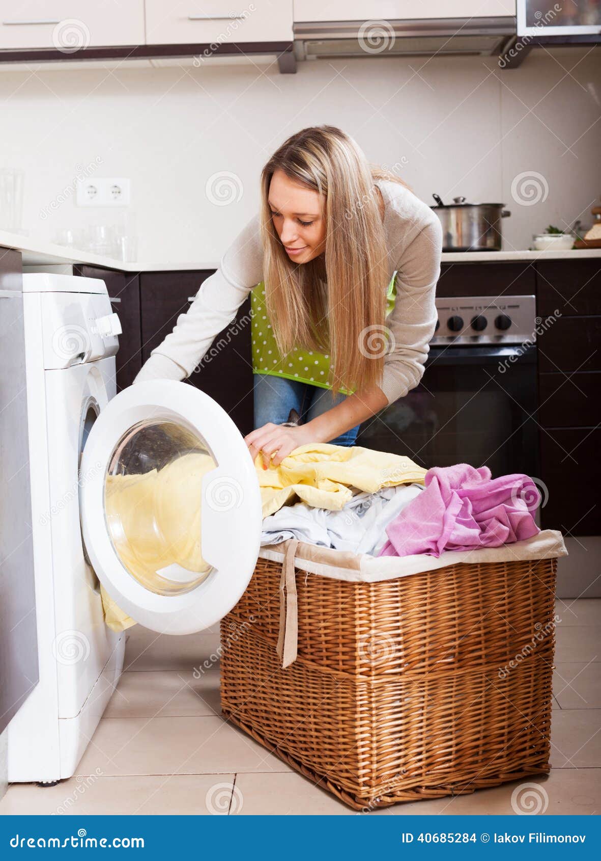 Young Woman Loading the Washing Machine Stock Photo - Image of basket ...