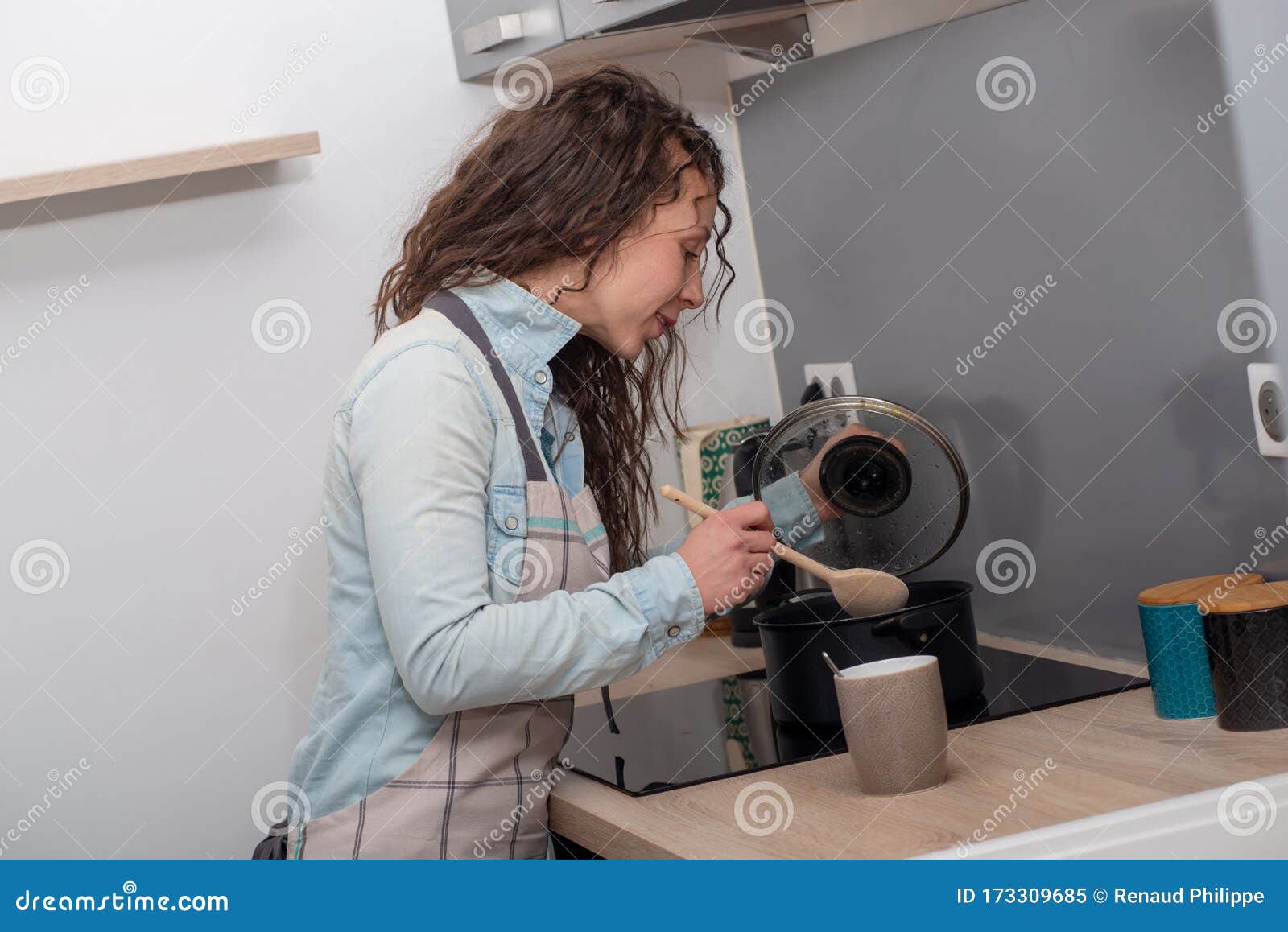 Young Woman with Long Hair is in the Kitchen Stock Image - Image of ...