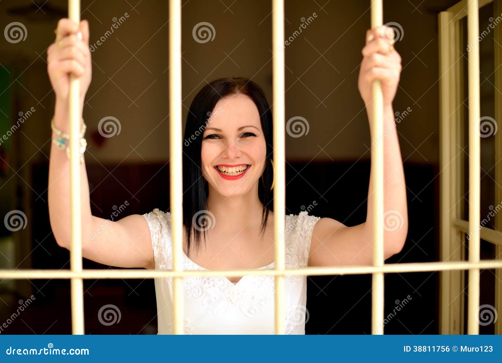 Young Woman Looking from Behind the Bars Stock Photo - Image of ...