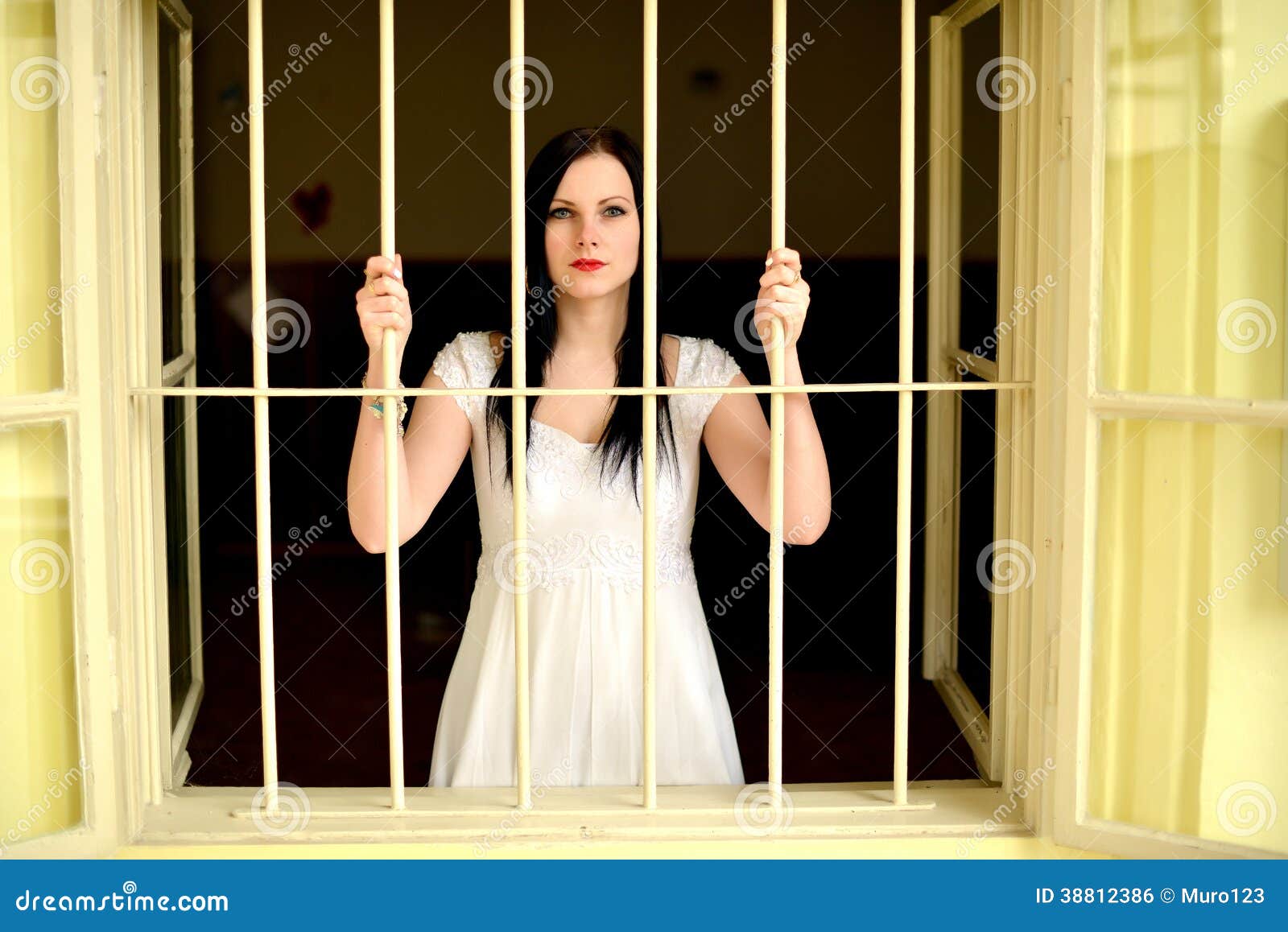 Young Woman Looking from Behind the Bars Stock Photo - Image of culture ...