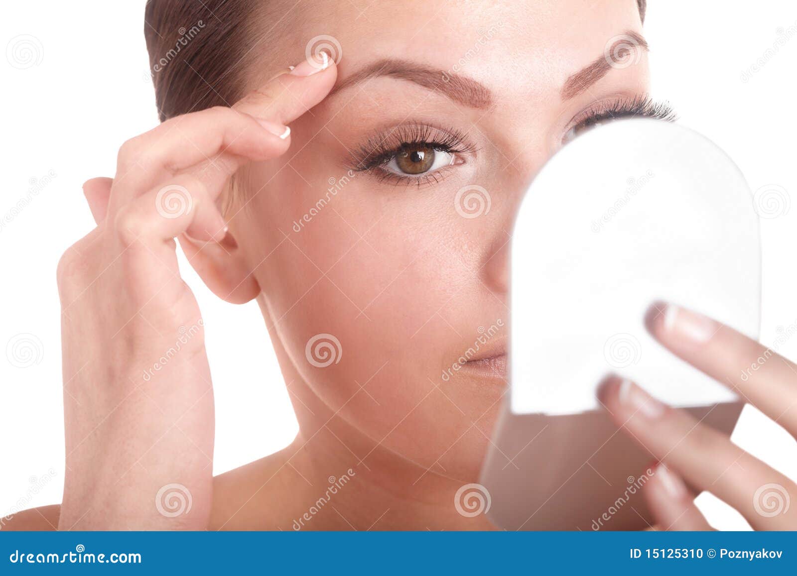 Young Woman Looking into Mirror. Stock Photo - Image of cosmetics ...