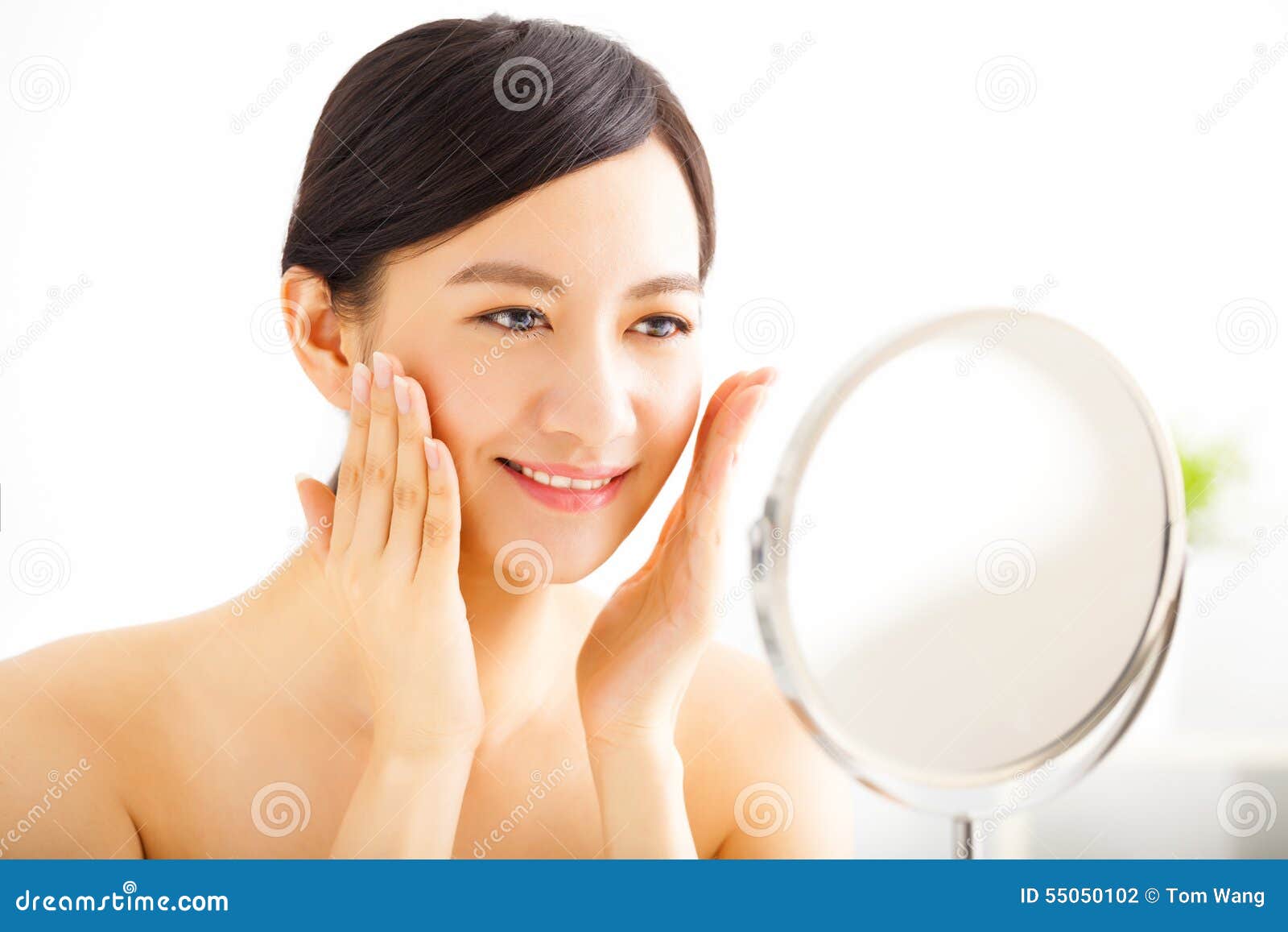 Young Woman Looking on Mirror Stock Photo - Image of care, smile: 55050102