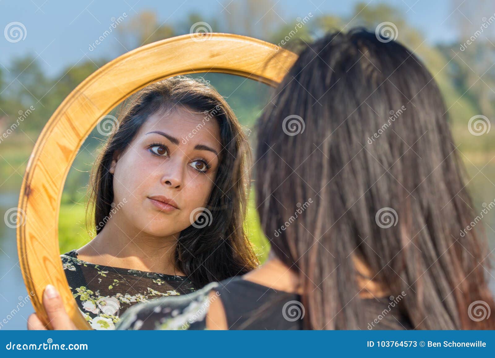 Woman Looking at Mirror in Nature Stock Image - Image of hair, face ...