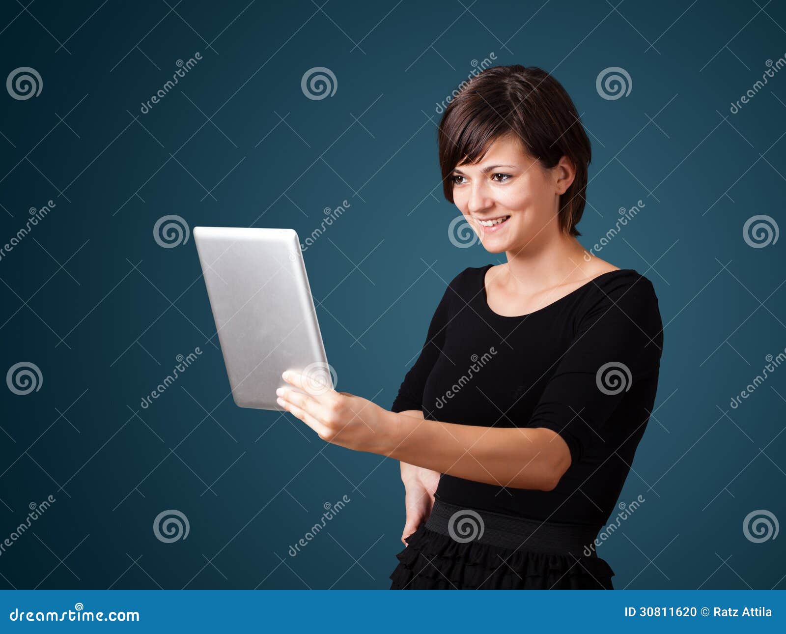 Young Woman Looking at Modern Tablet Stock Photo - Image of display ...