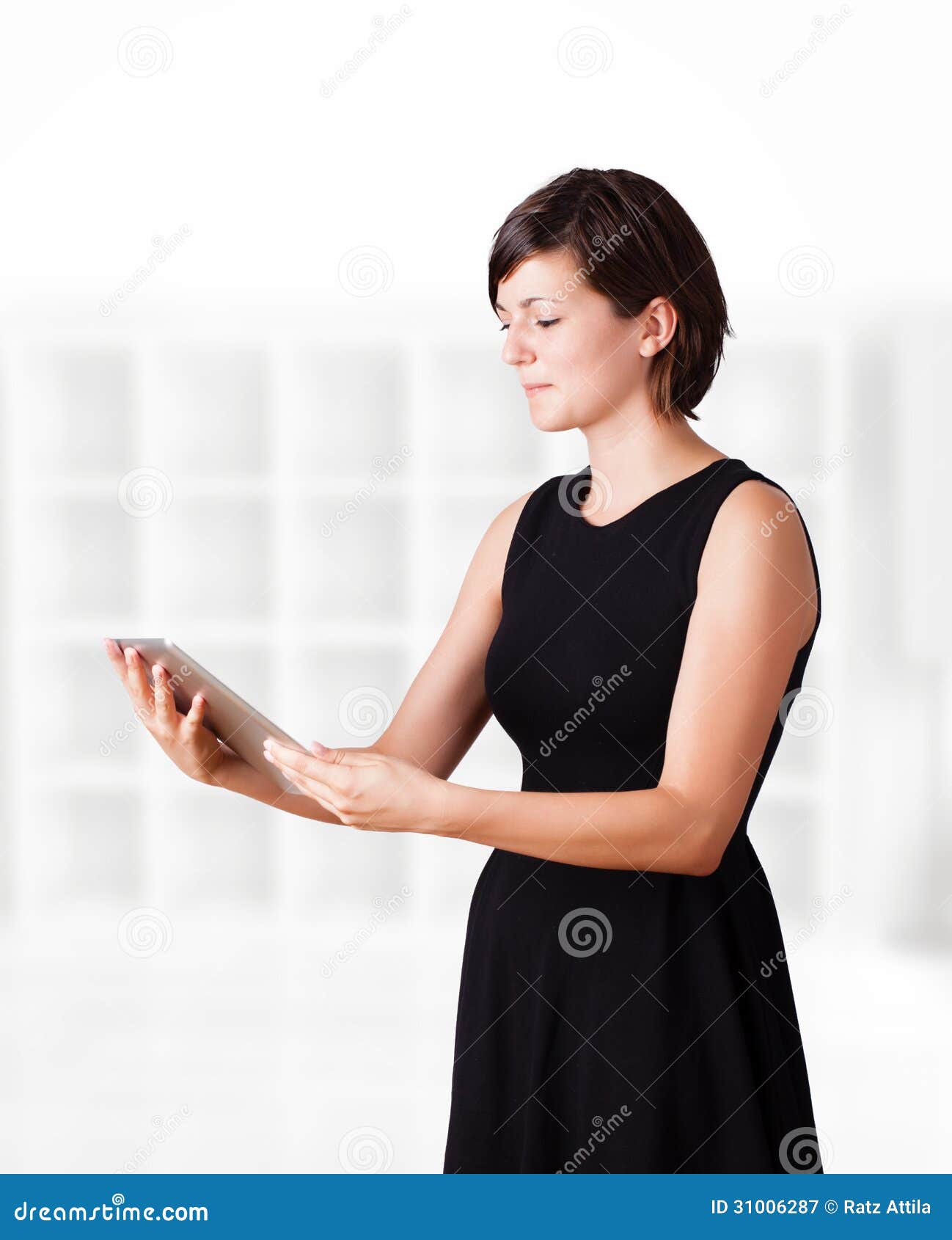 Young Woman Looking at Modern Tablet Stock Image - Image of hand ...
