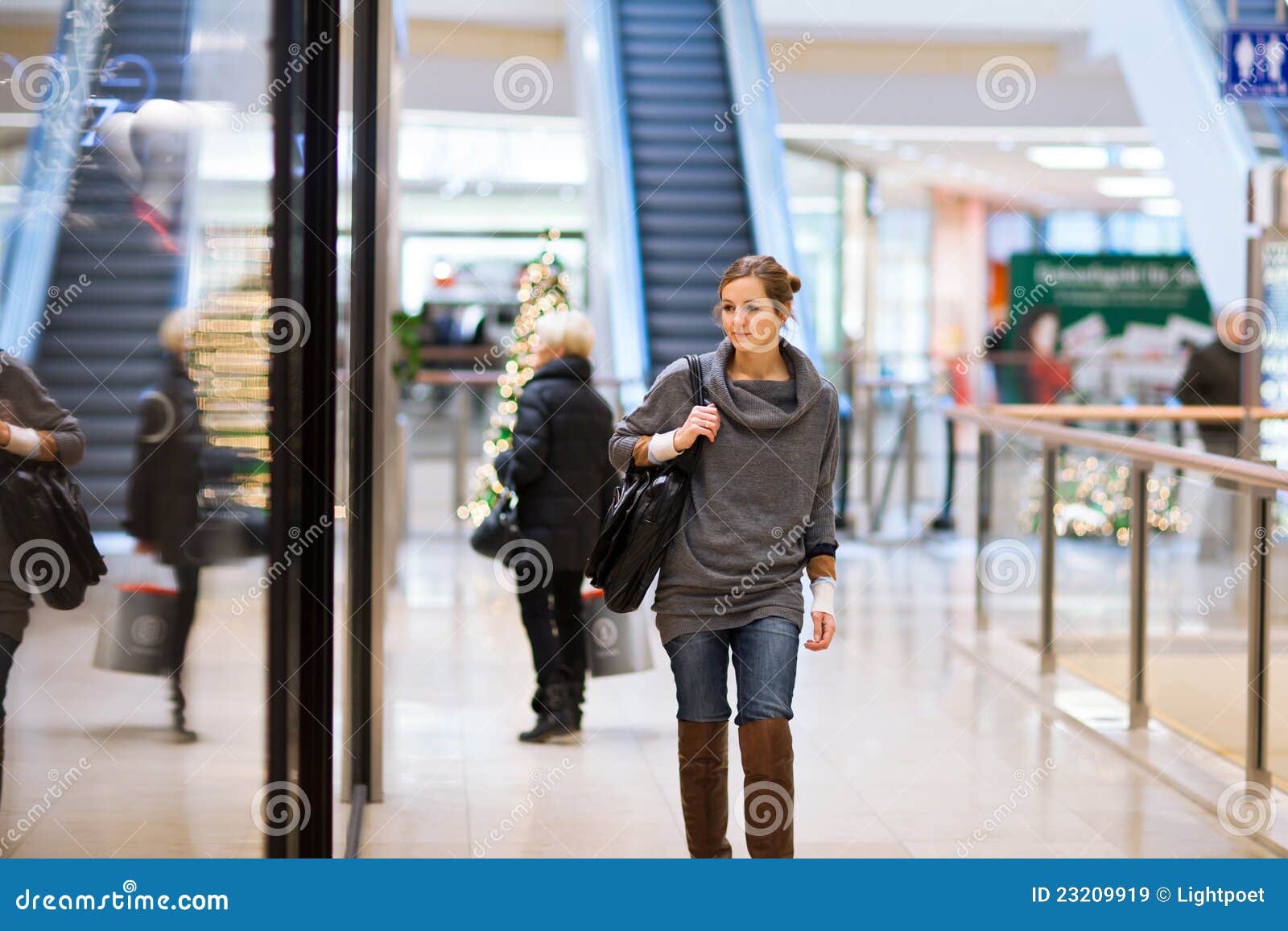 Young Woman Looking at Store Windows Stock Image - Image of arcade ...