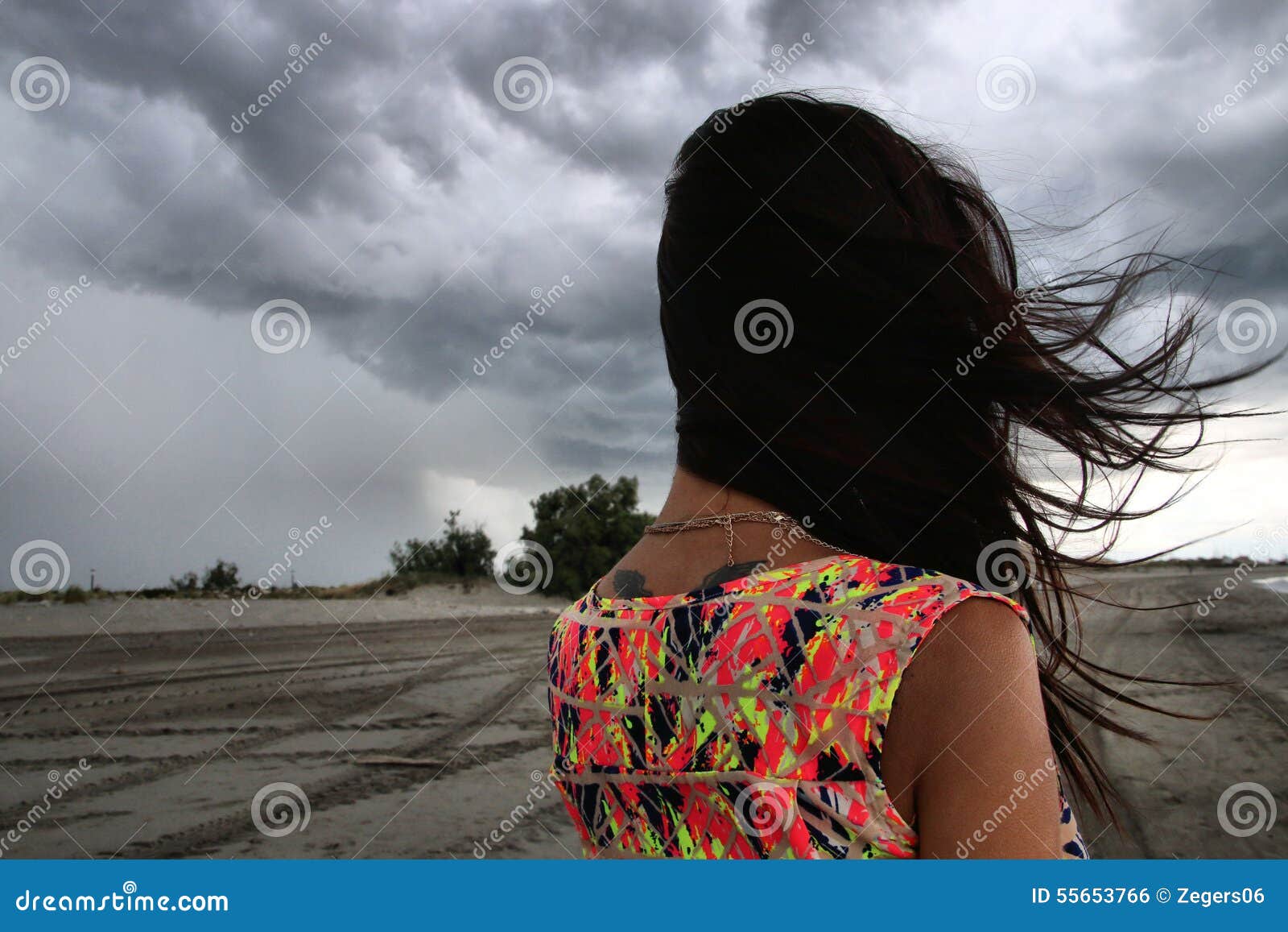 Young Woman Looking at a Storm Stock Photo - Image of woman, pain: 55653766