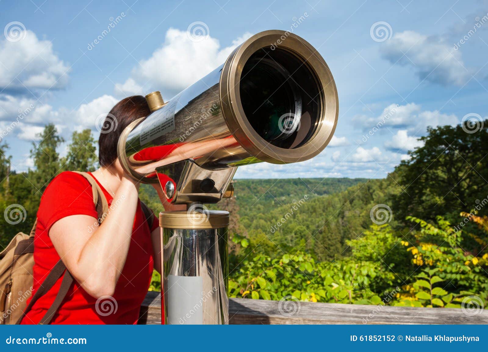 Young Woman Looking through Tourist Telescope Stock Photo - Image of ...