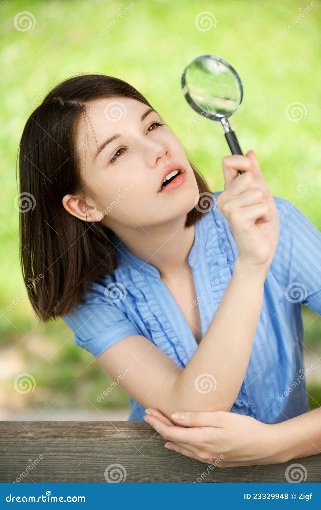Young Woman Looks through Magnifier Stock Photo - Image of lens ...