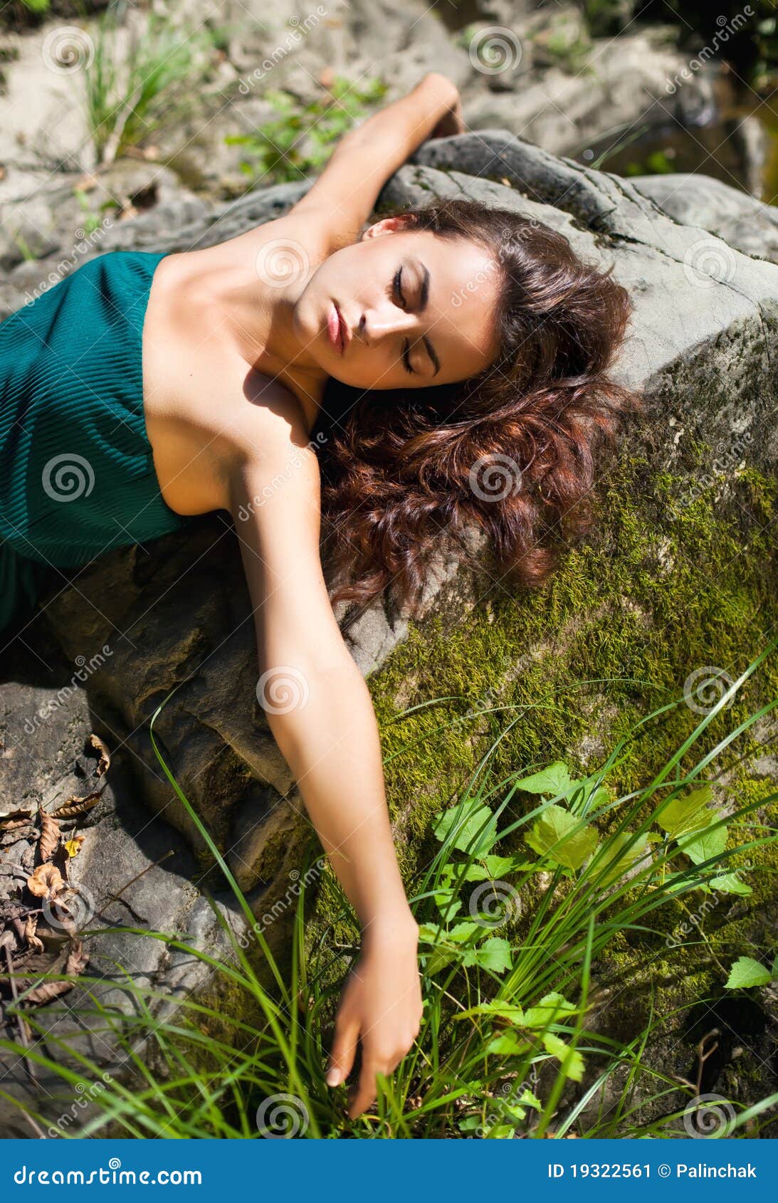 Young Woman Lying on the Stones Stock Image - Image of outdoor, leisure ...