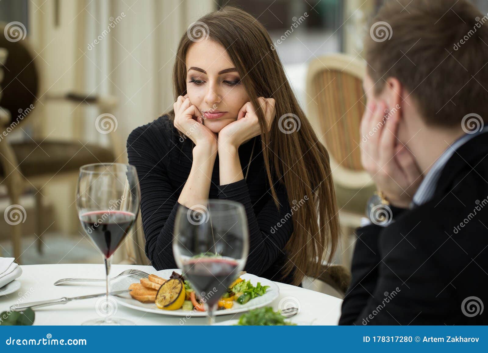 Young Woman Making an Exasperated Expression Gesture on a Bad Date at ...