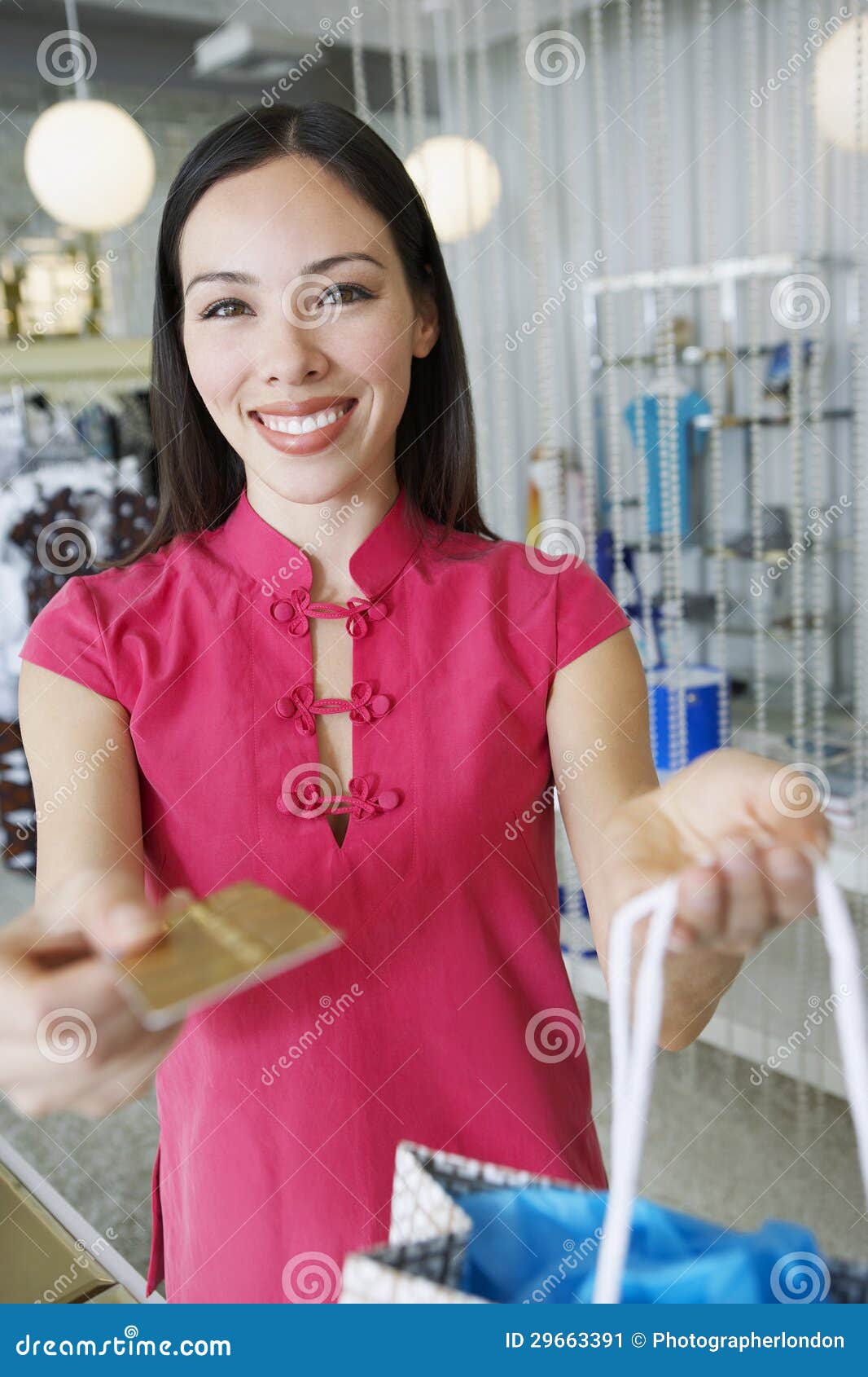Young Woman Making a Purchase Stock Image - Image of people, giving ...